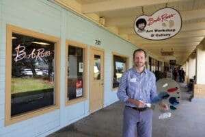 Nicholas Hankins poses outside the Bob Ross Art Workshop & Gallery in ...